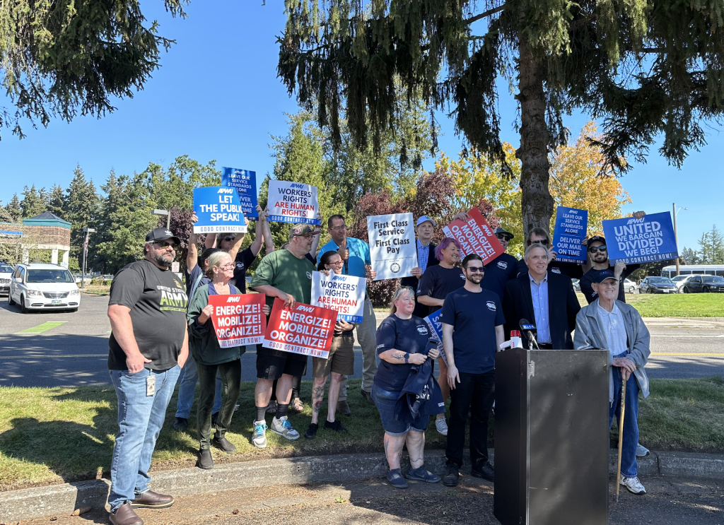 Postal workers, supporters rally on 'Day of Action' - The Chronicle